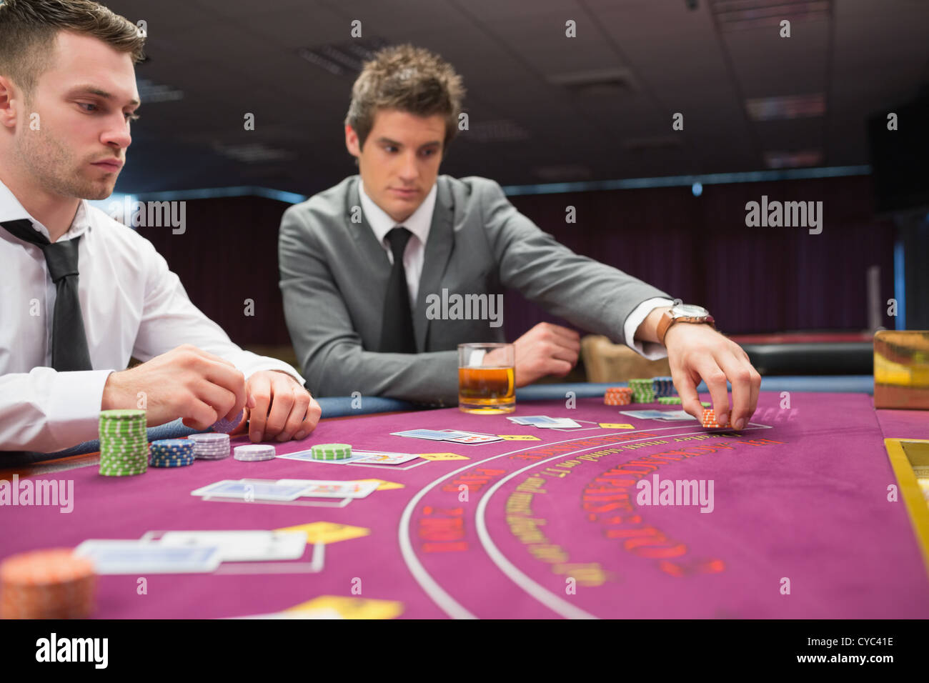Card game man suit hi-res stock photography and images - Alamy