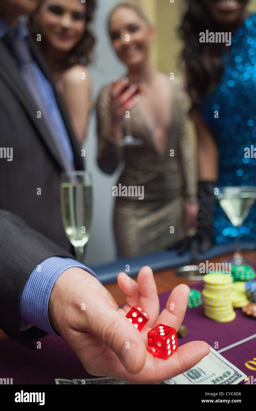 Female throwing dice hi-res stock photography and images - Alamy