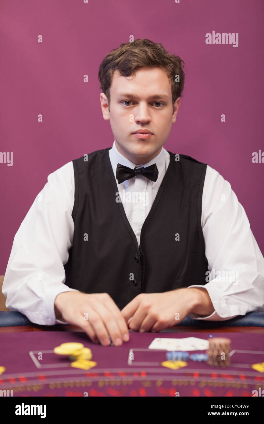 Young man dealing cards hi-res stock photography and images - Alamy