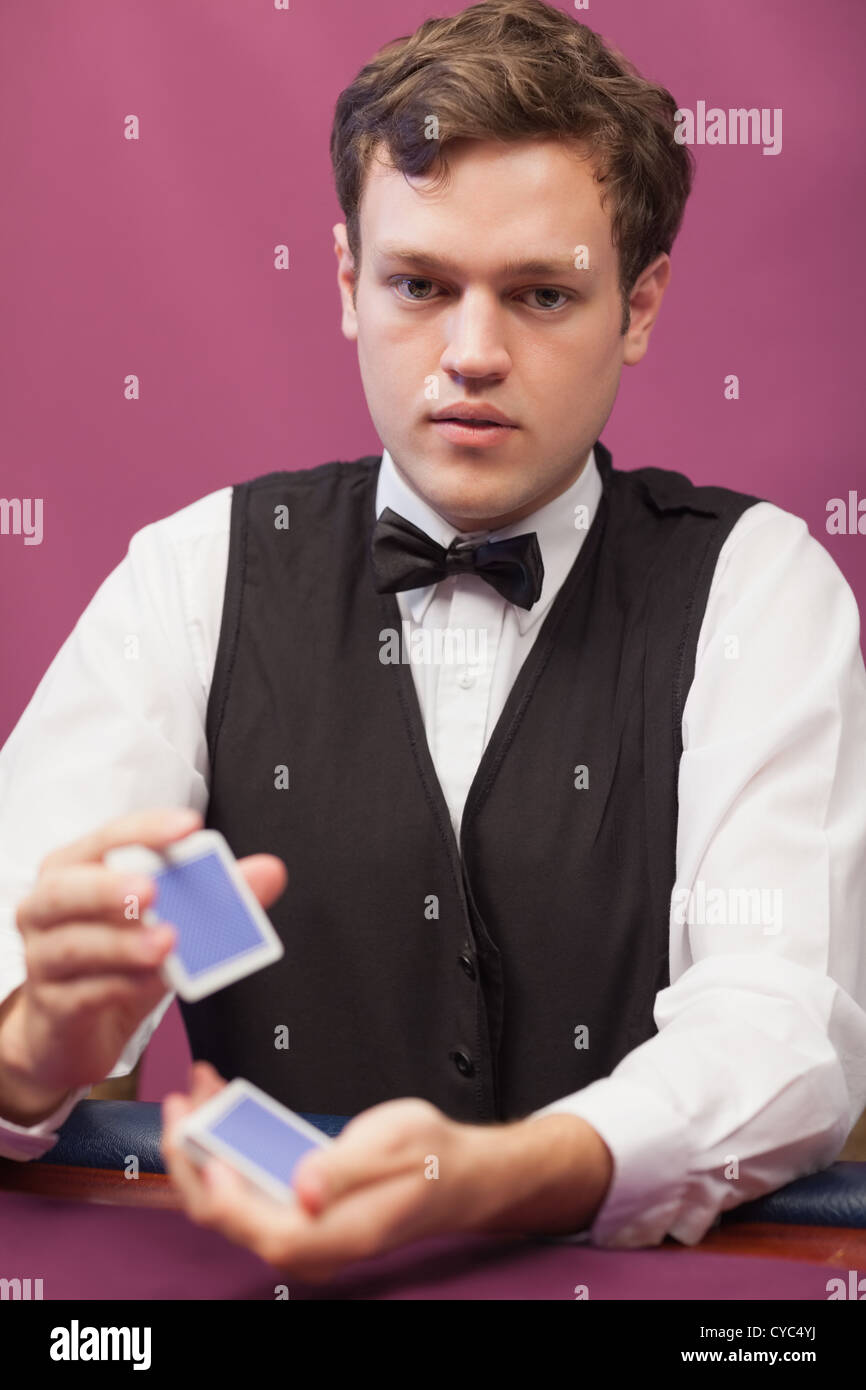 Croupier shuffling cards hi-res stock photography and images - Alamy