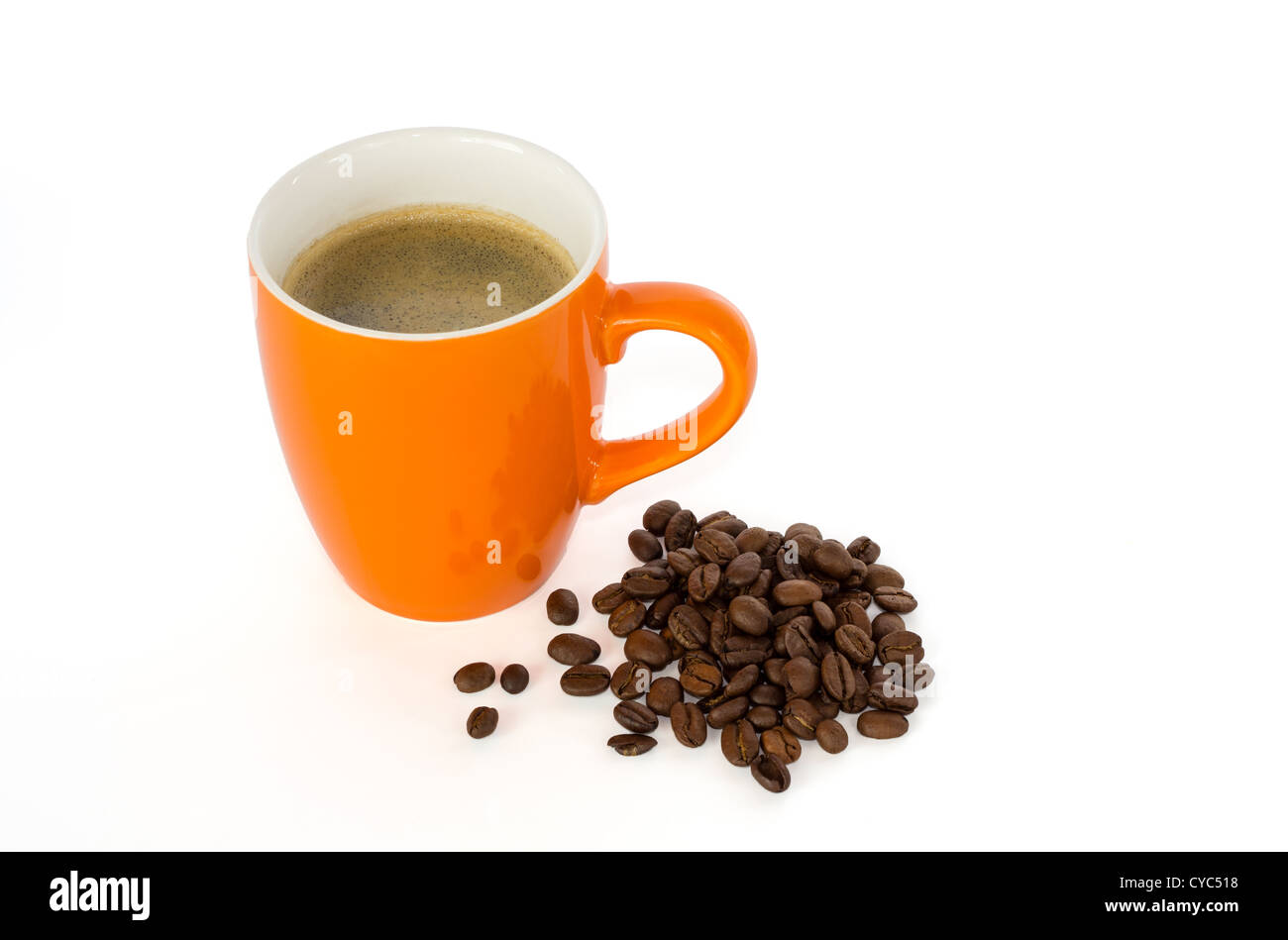 Black coffee in an orange mug and coffee beans Stock Photo - Alamy