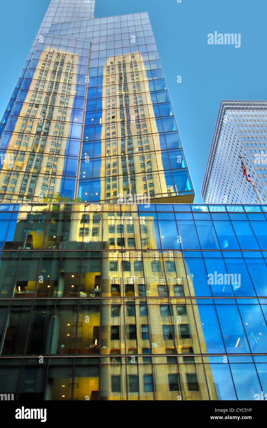 Reflections in the windows of a building in Midtown Manhattan, New York ...