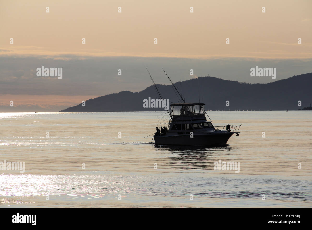 View from Stanley Park of fishing boat in Burrard Inlet, Vancouver at ...
