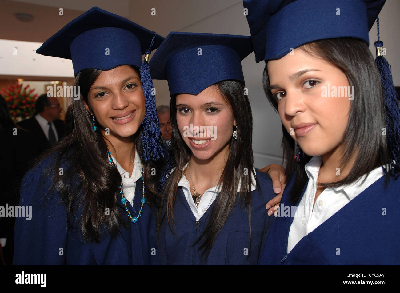 Three young Latinas in the high school graduation ceremony Stock Photo ...