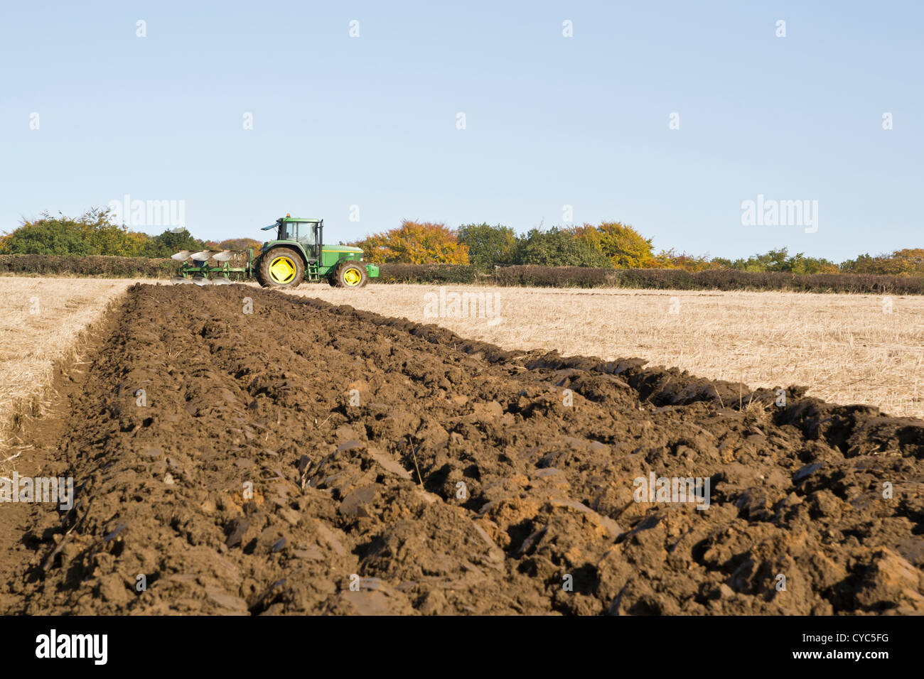 Ploughed field and tractor hi-res stock photography and images - Alamy