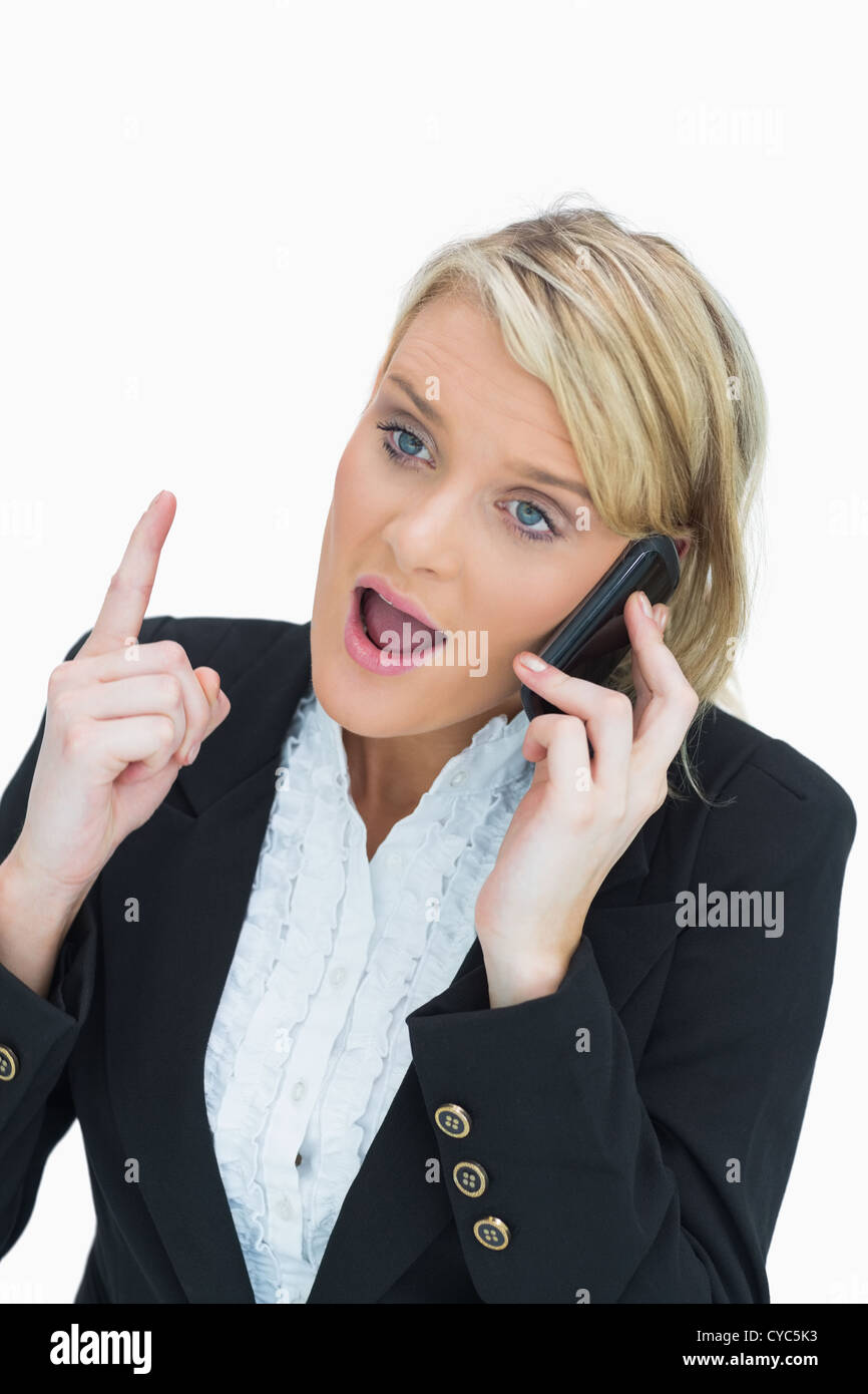 Angry blonde businesswoman on phone hi-res stock photography and images ...