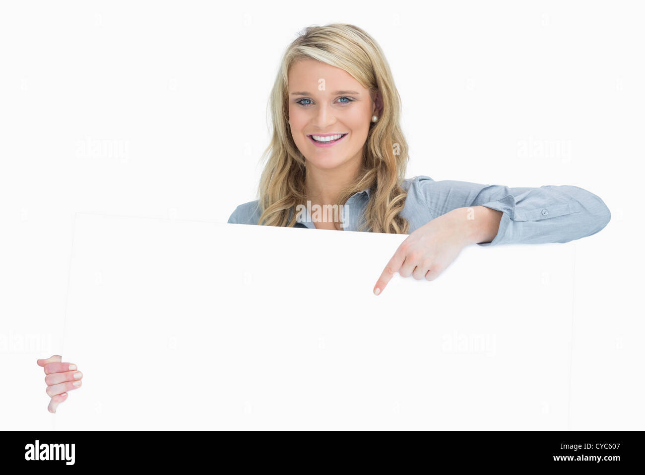 Joyful woman pointing finger Cut Out Stock Images & Pictures - Alamy