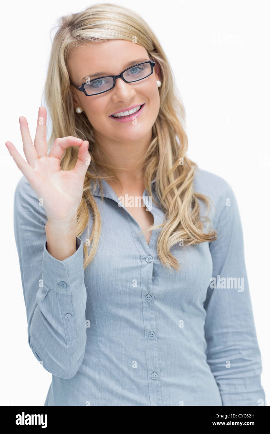 Woman showing ok sign Stock Photo - Alamy