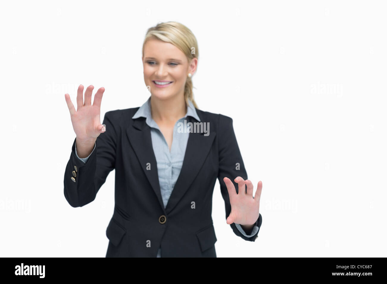 Smiling business woman presenting Stock Photo - Alamy