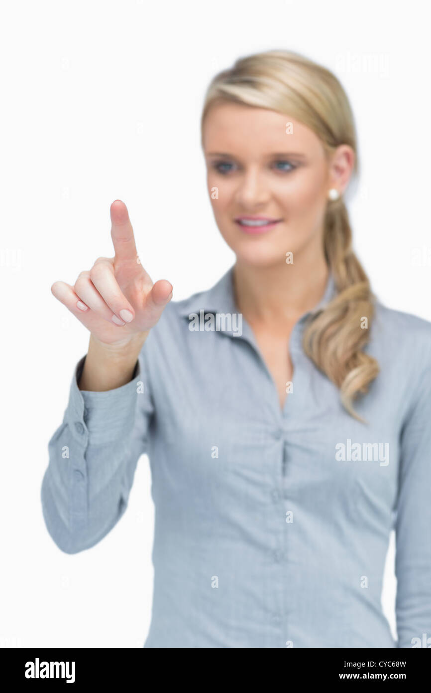 Businesswoman pointing at something Stock Photo - Alamy