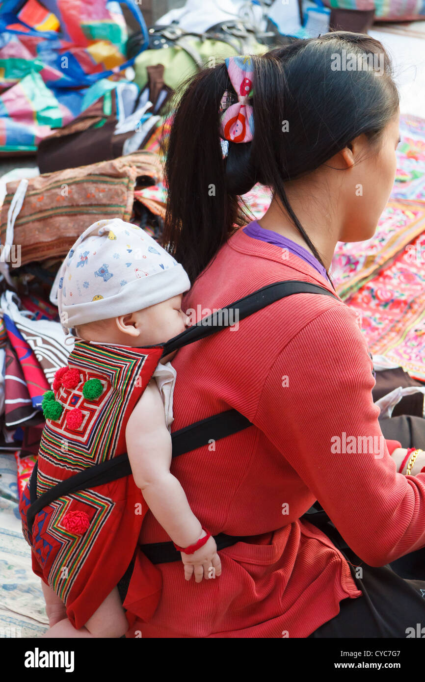 Mother with little Baby in Luang Prabang, Laos Stock Photo - Alamy