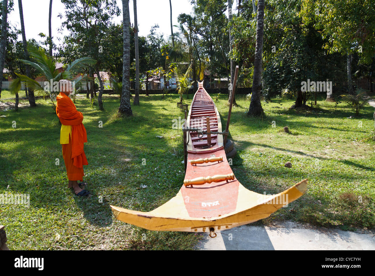 Laotian Riverboat in the Garden of the Temple Vat Aham in Luang Prabang ...