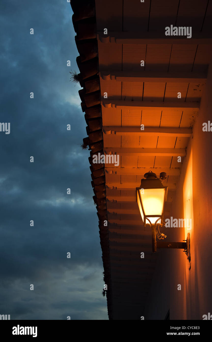 A colonial roof and light taken at dusk Stock Photo - Alamy