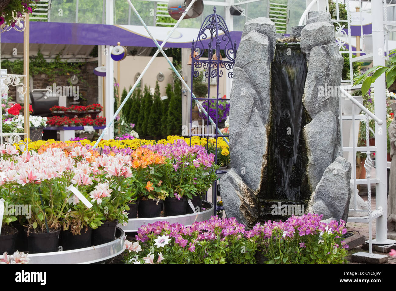 Fake waterfall in garden center Stock Photo - Alamy