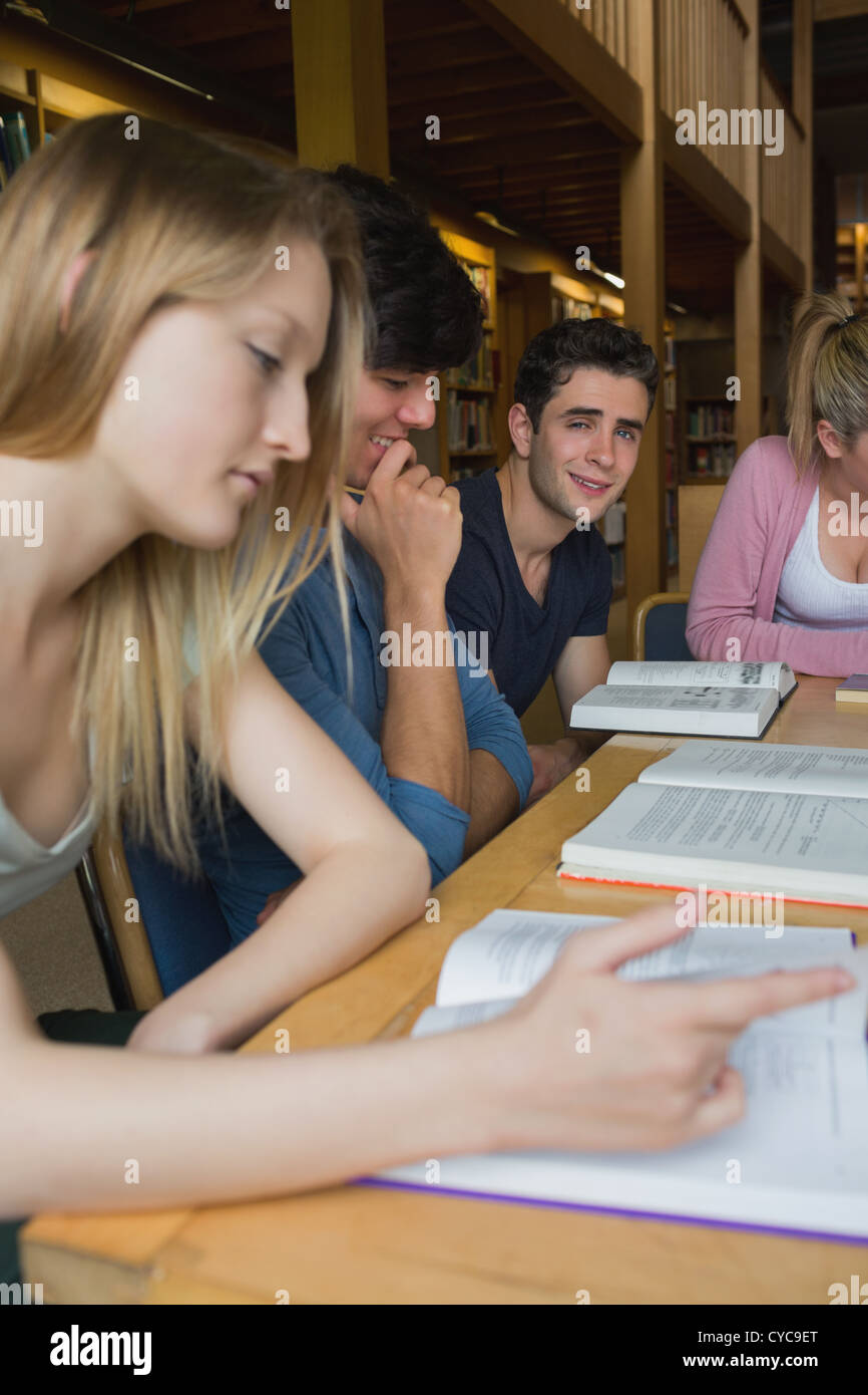 Students in the library in a study group Stock Photo - Alamy
