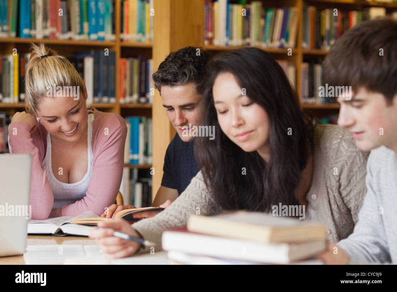 Students sitting learning Stock Photo - Alamy