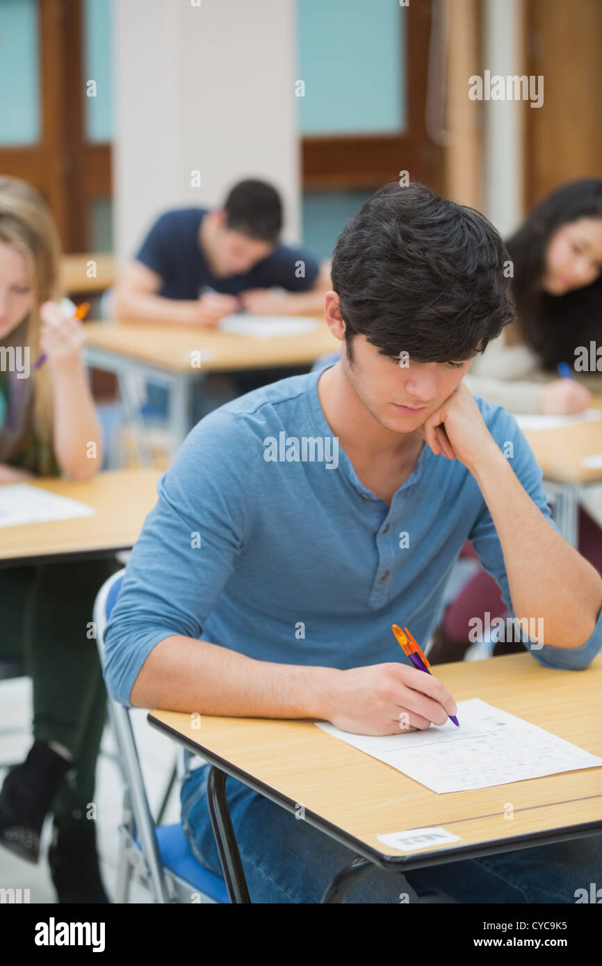Student taking exam Stock Photo - Alamy