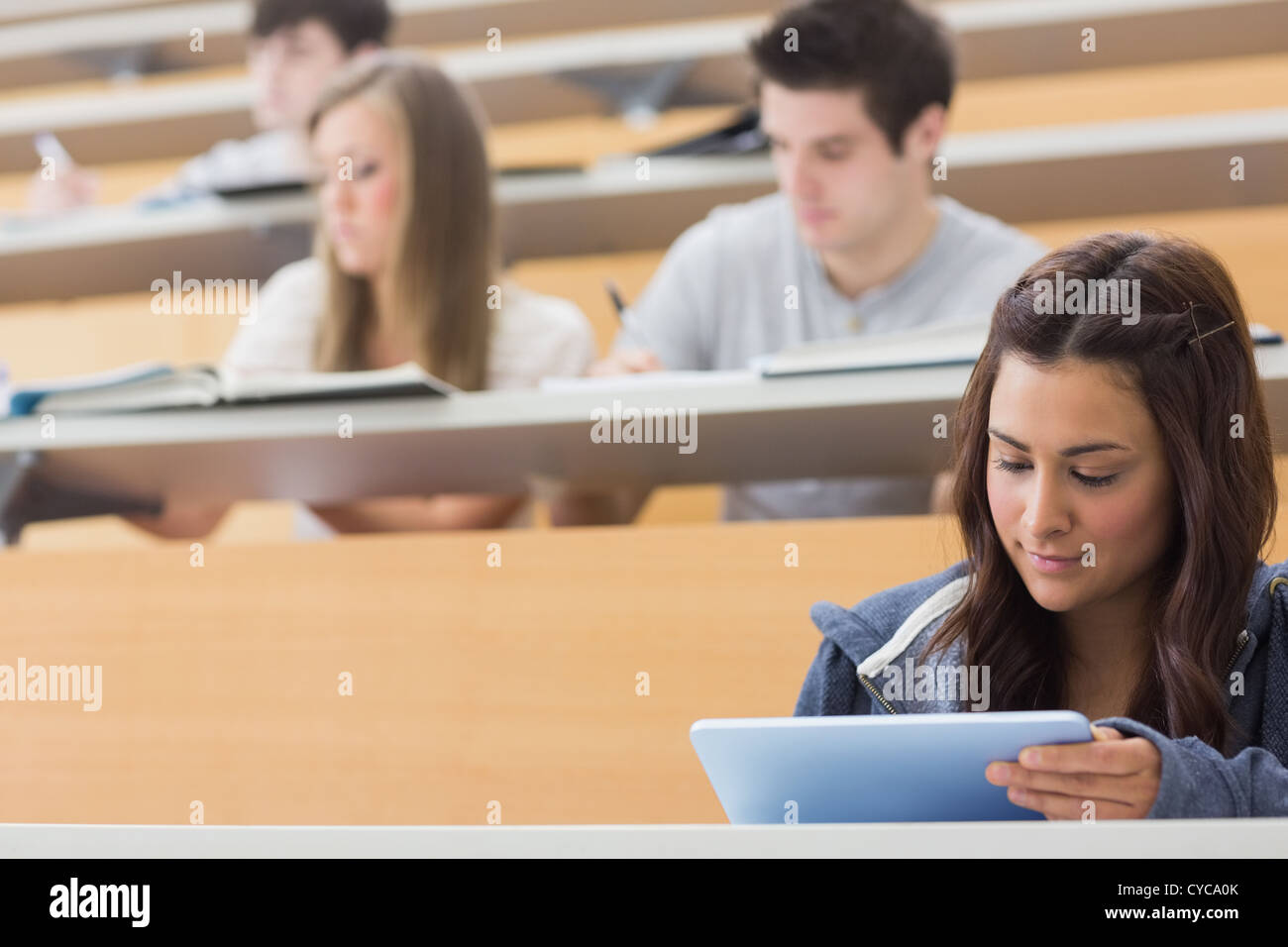 Student using tablet pc to take notes Stock Photo - Alamy