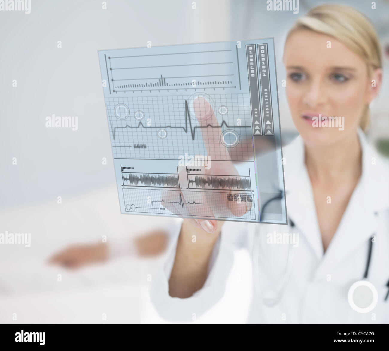 Doctor touching ECG interface Stock Photo - Alamy