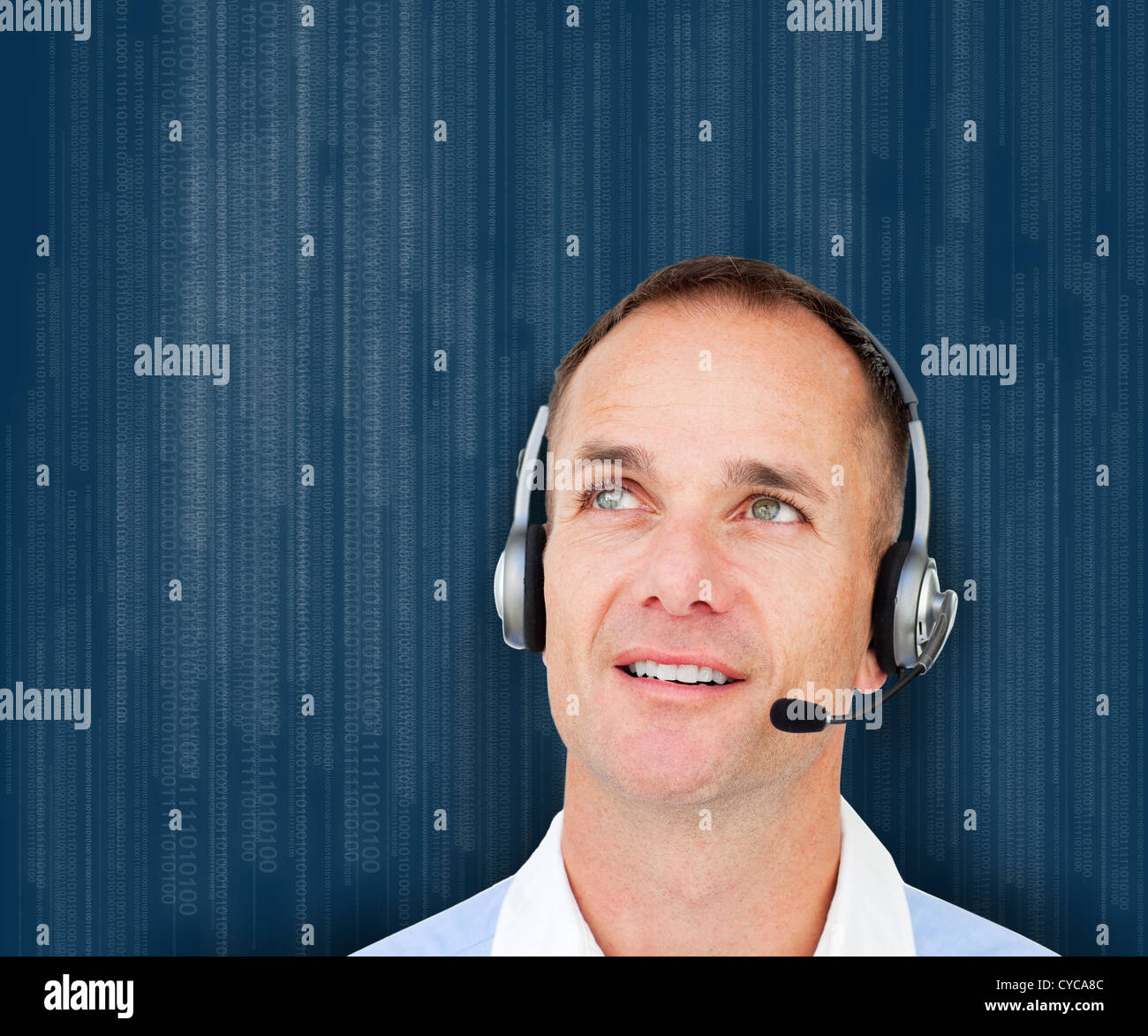 Businessman wearing head set Stock Photo - Alamy