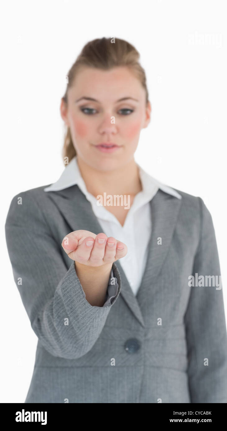 Woman holding her hand to the front Stock Photo - Alamy