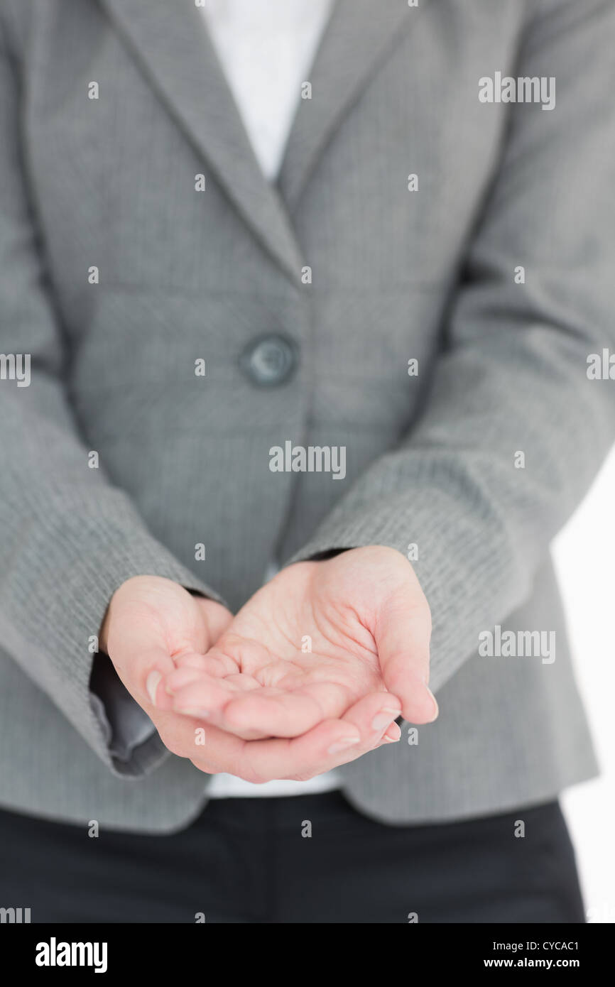 Woman holding her hands Stock Photo - Alamy