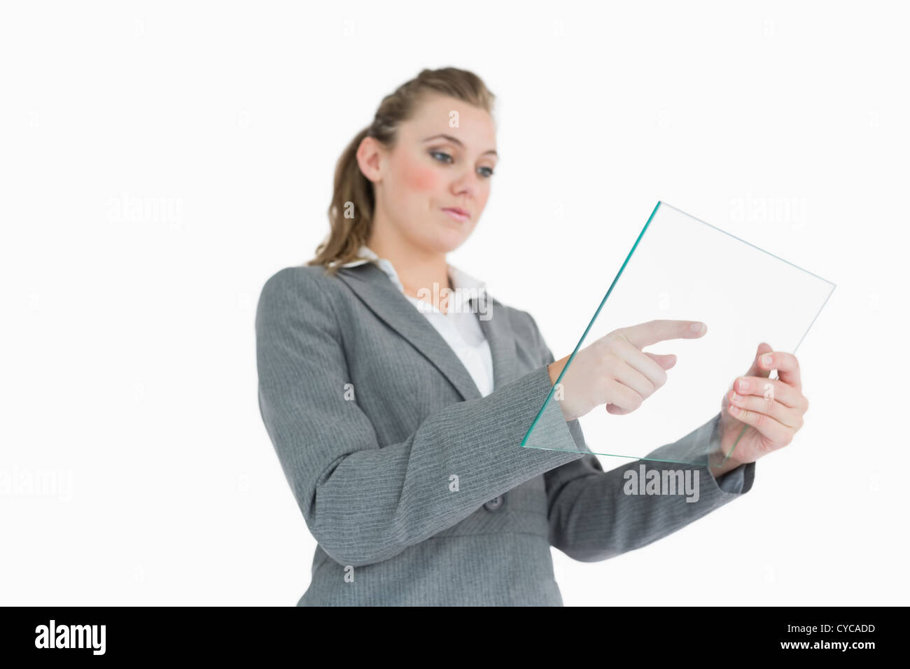 Woman pressing something on the pane Stock Photo - Alamy