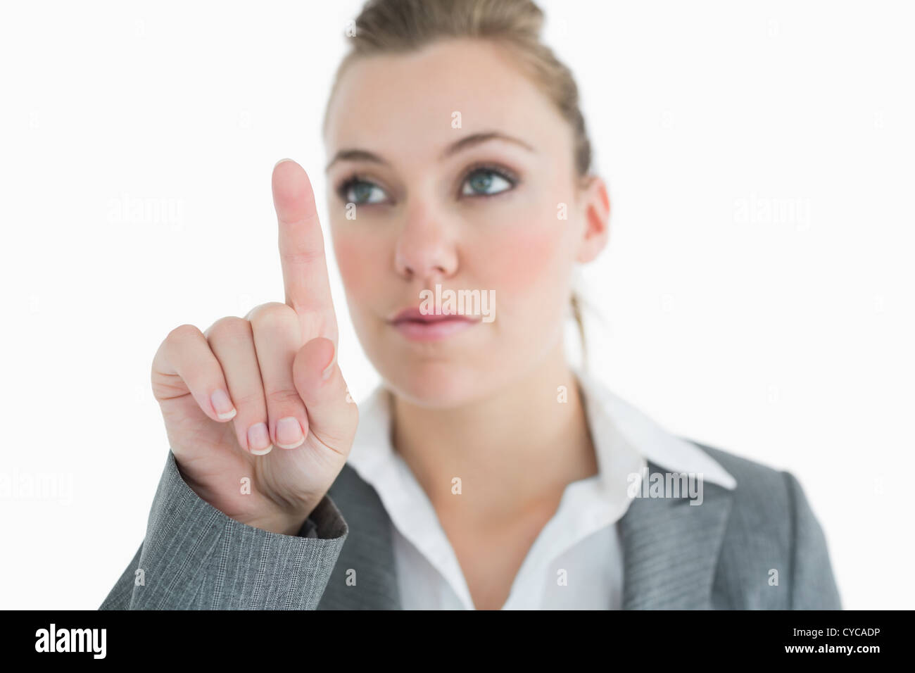 Woman pointing at something above Stock Photo - Alamy