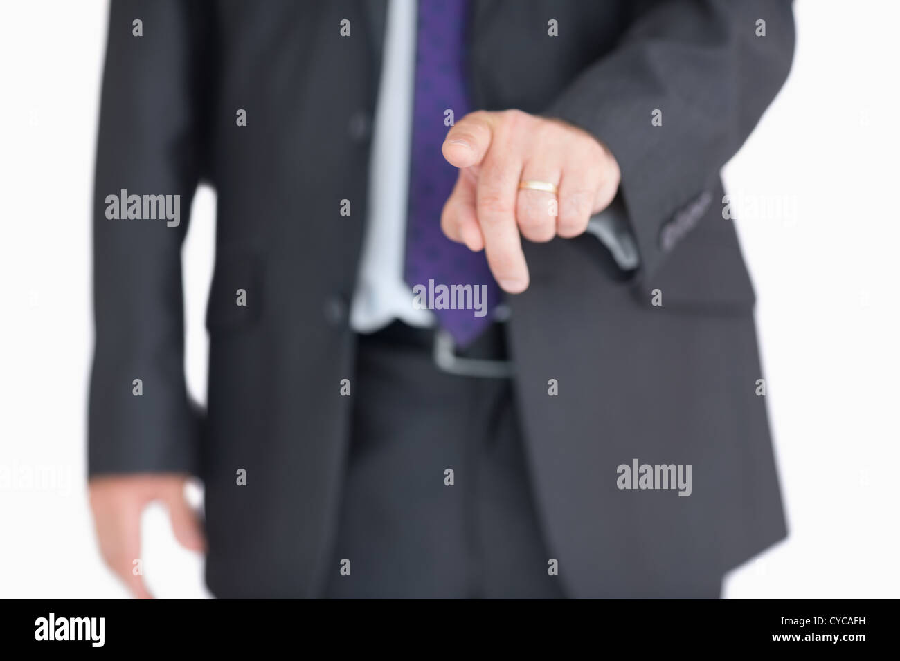 Businessman pointing to the front Stock Photo - Alamy