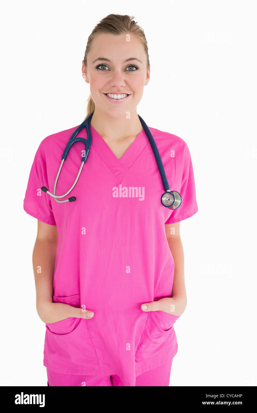 Happy doctor in pink scrubs Stock Photo - Alamy