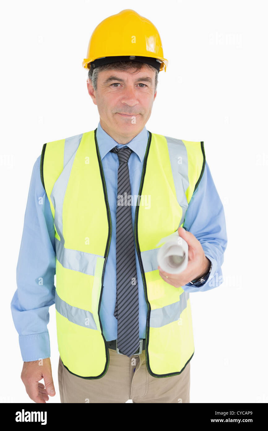 Man in yellow vest holding hi-res stock photography and images - Alamy