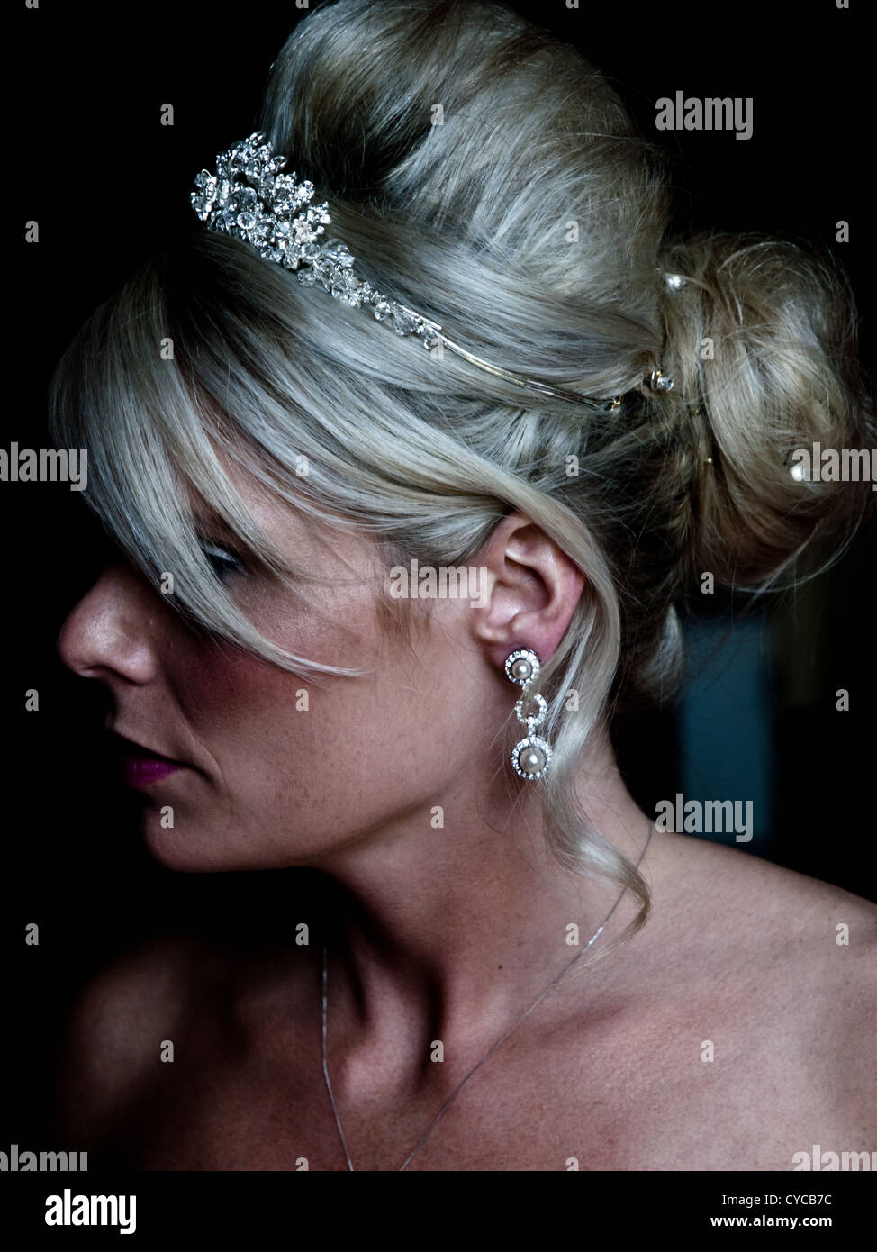 A bride looks pensive and thoughtful on her wedding day Stock Photo - Alamy