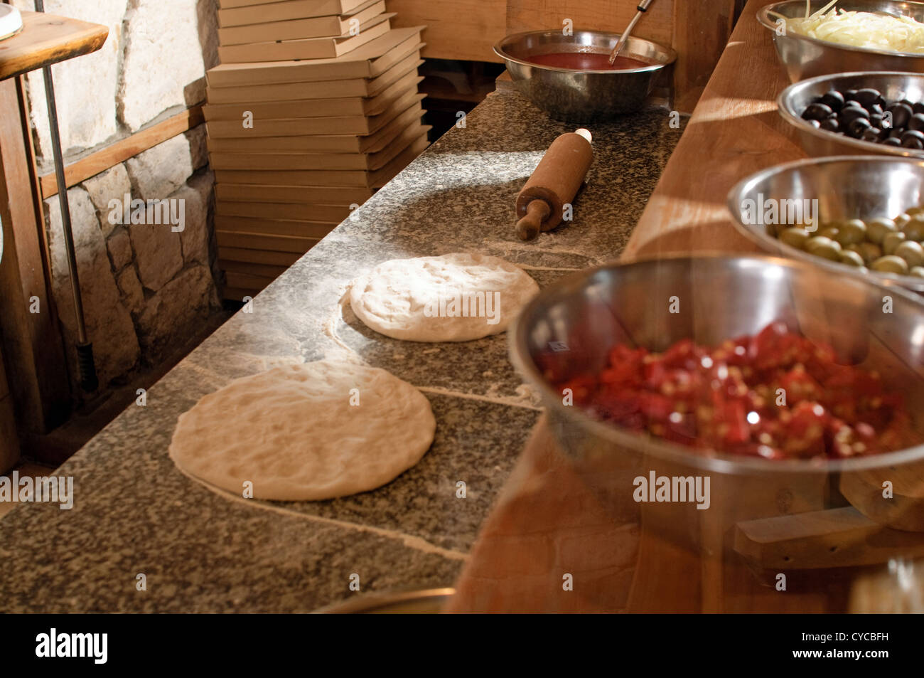 Photo of table with pizza Stock Photo - Alamy