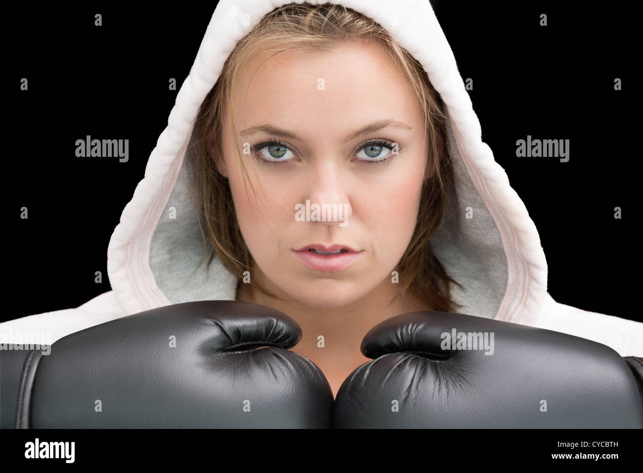 Woman wearing boxing gloves and robe Stock Photo - Alamy