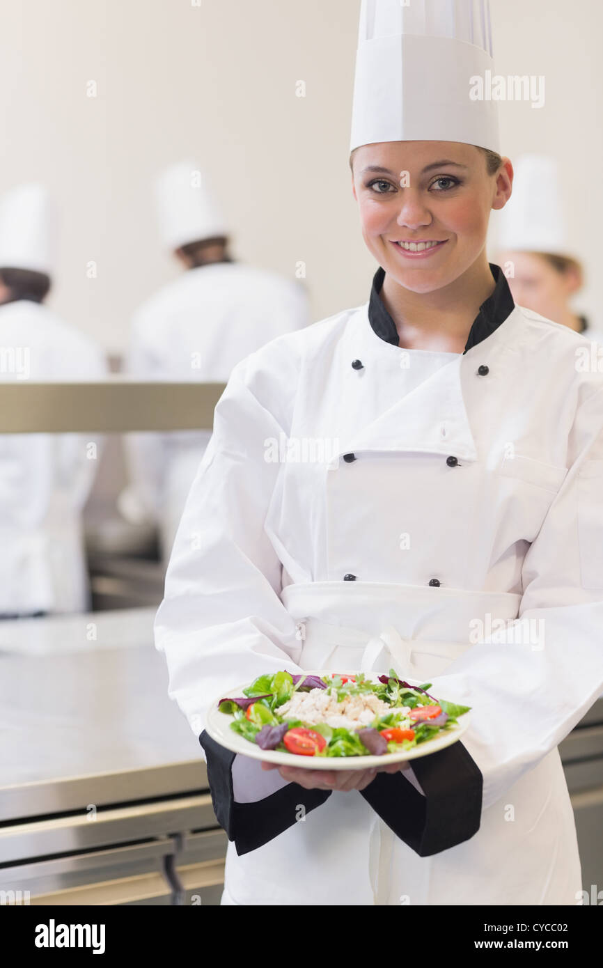 Chef showing her salad Stock Photo - Alamy