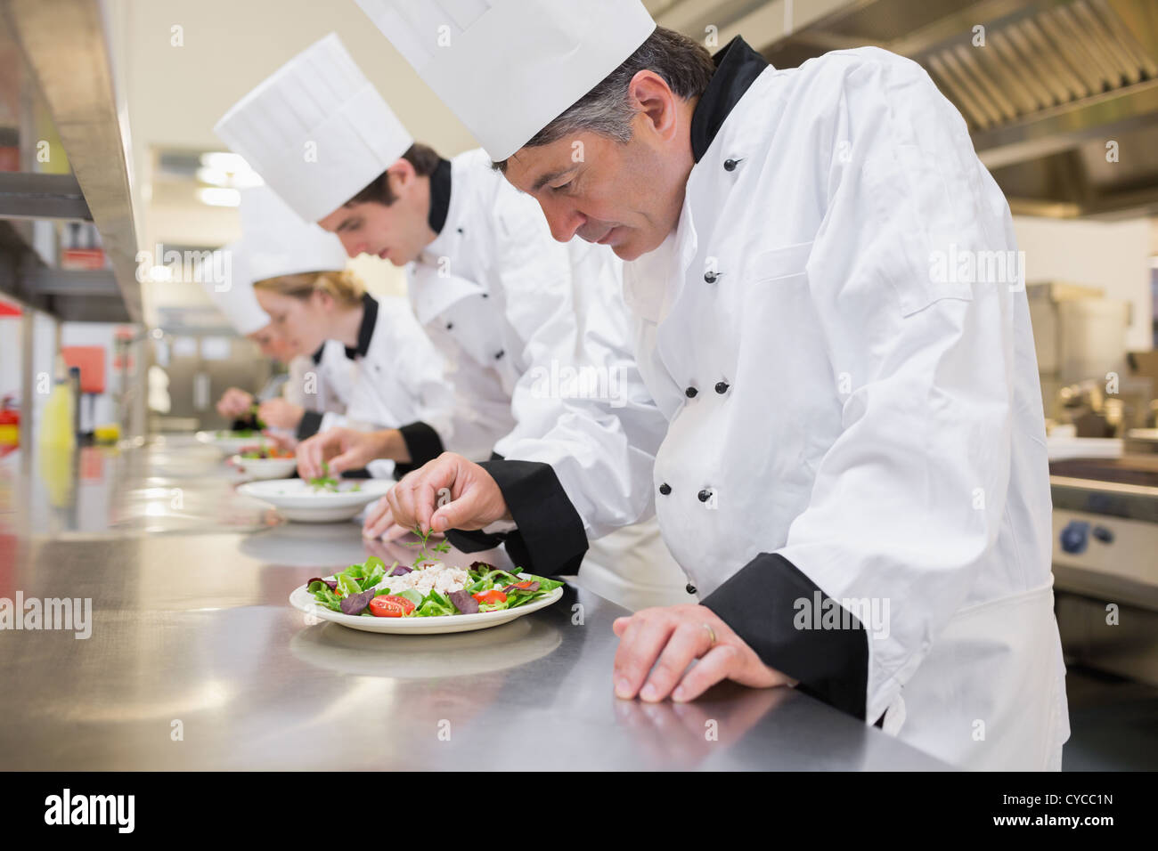 Chef's preparing their salads Stock Photo - Alamy