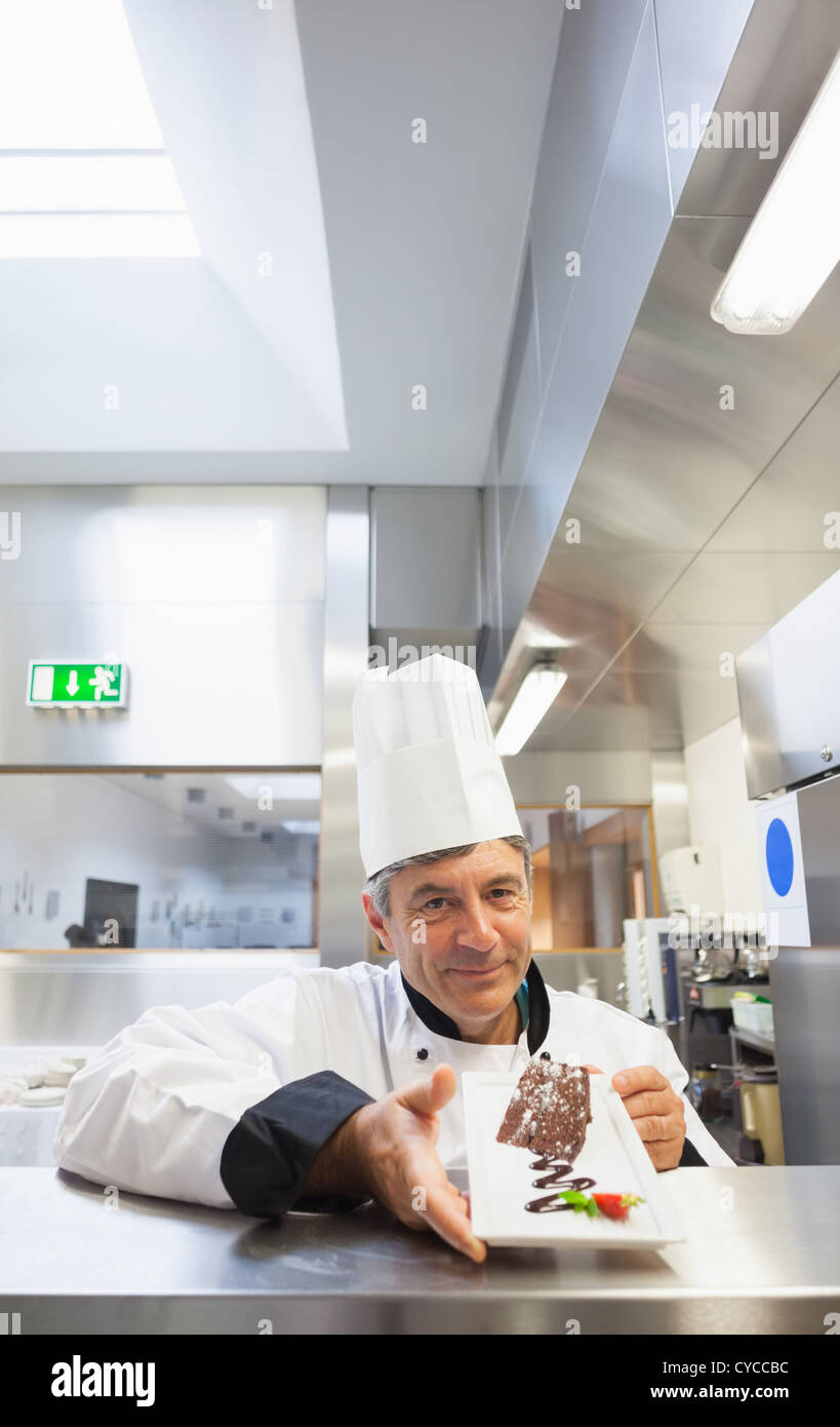 Chef presenting a desert Stock Photo - Alamy