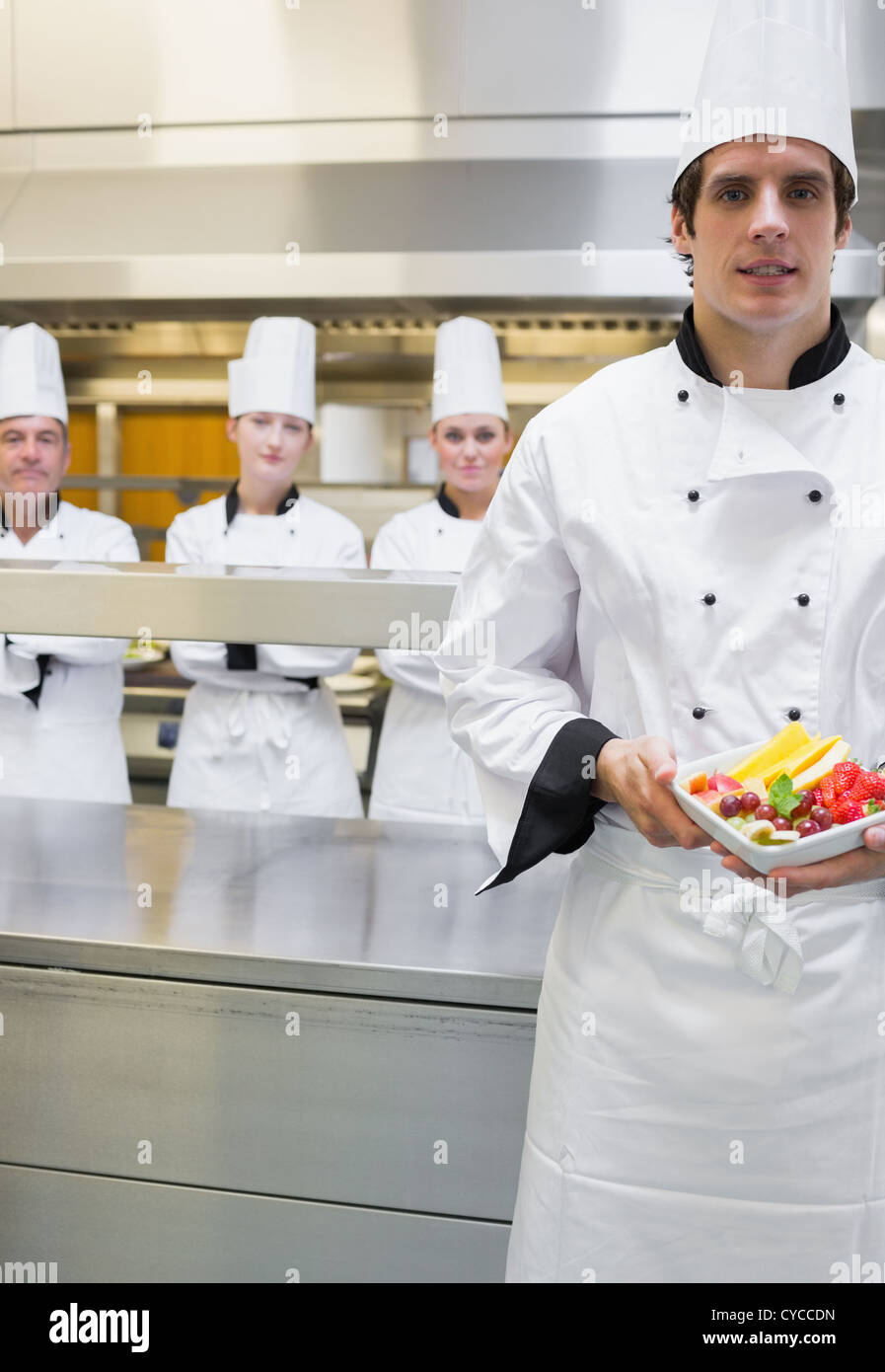 Chef presenting fruit salad Stock Photo - Alamy