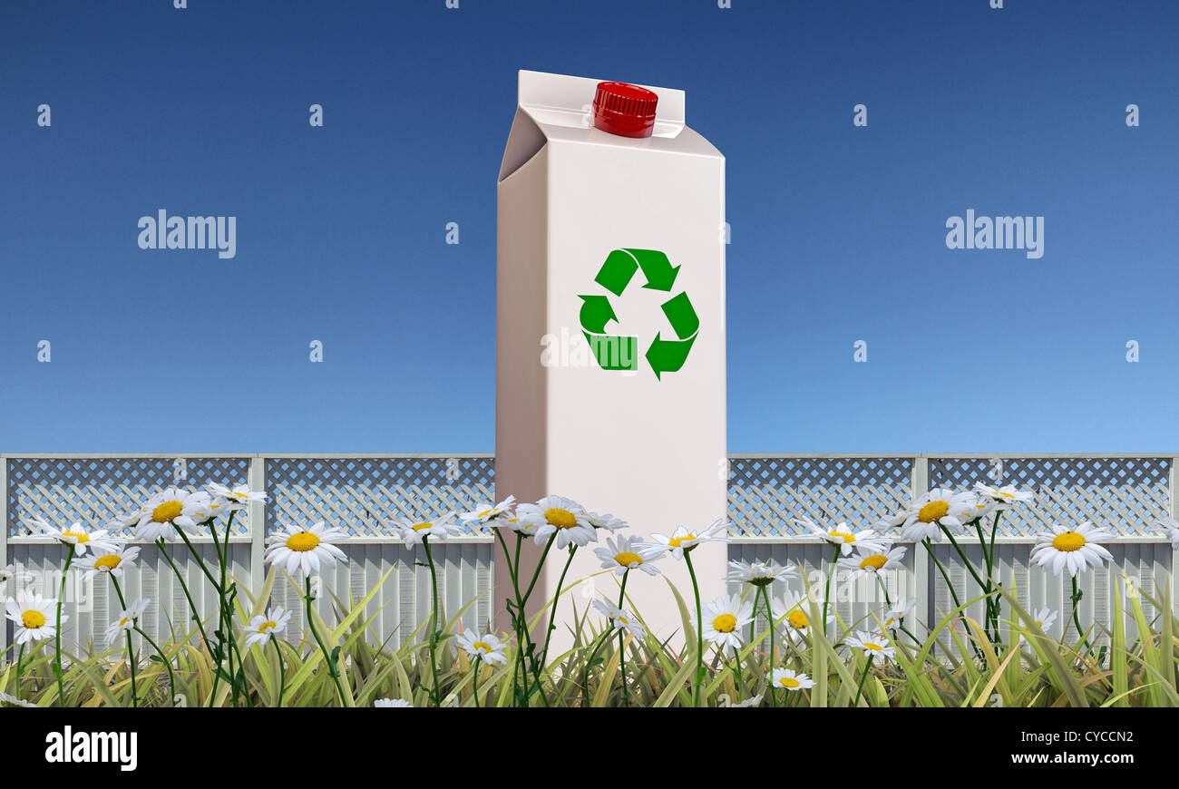 milk package with recycle symbol on green grass Stock Photo - Alamy