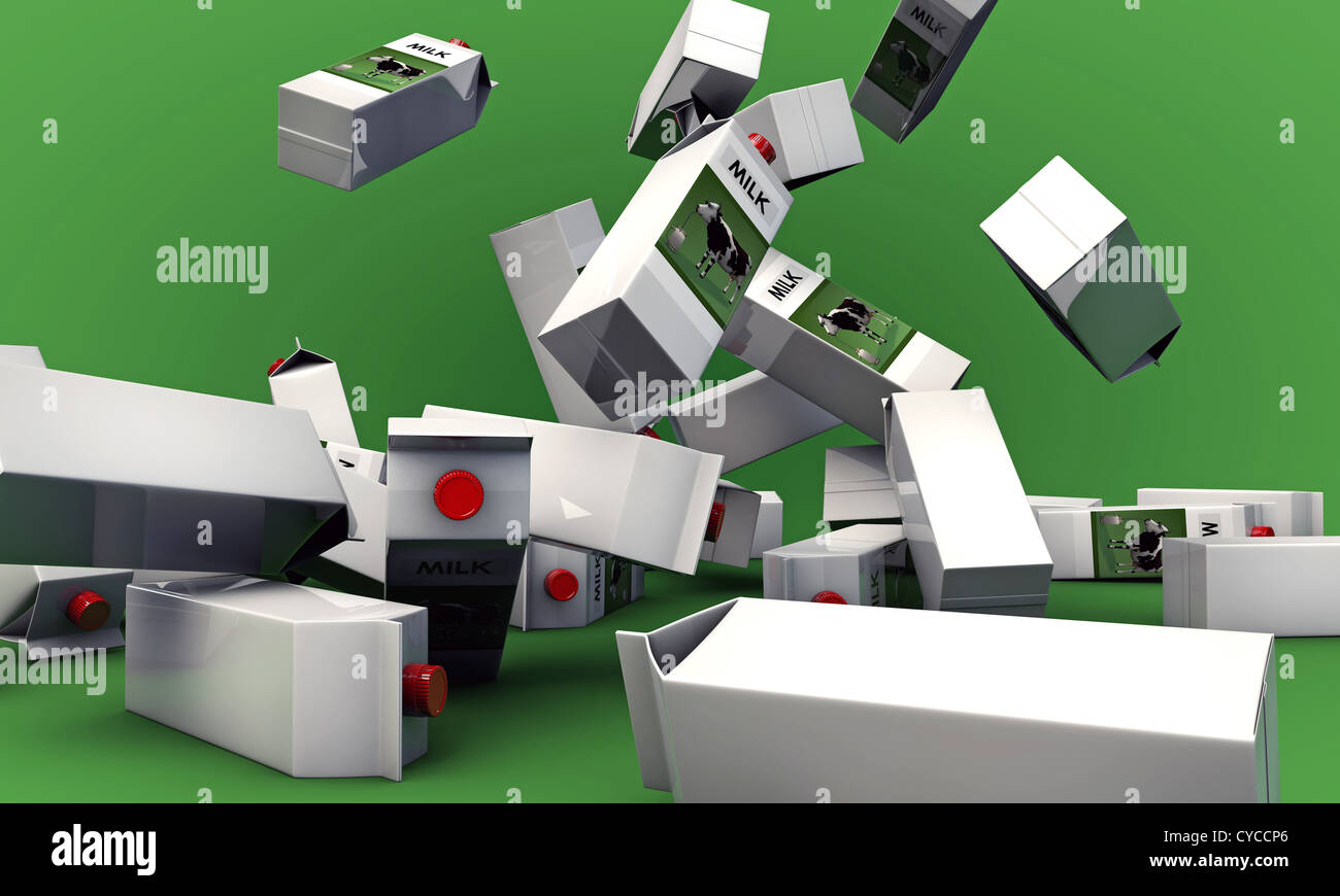 milk packages falling down on green background Stock Photo - Alamy