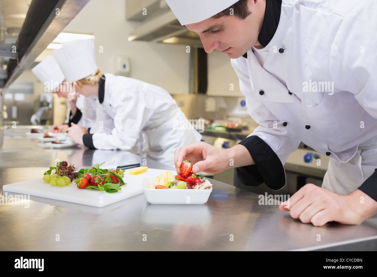 Chef preparing a fruit salad Stock Photo - Alamy
