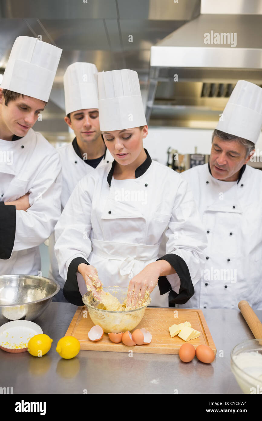 Trainees learning how to prepare dough Stock Photo - Alamy