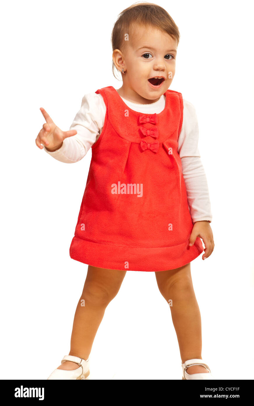 Amazed toddler girl gesticulate with fingers and having an idea ...