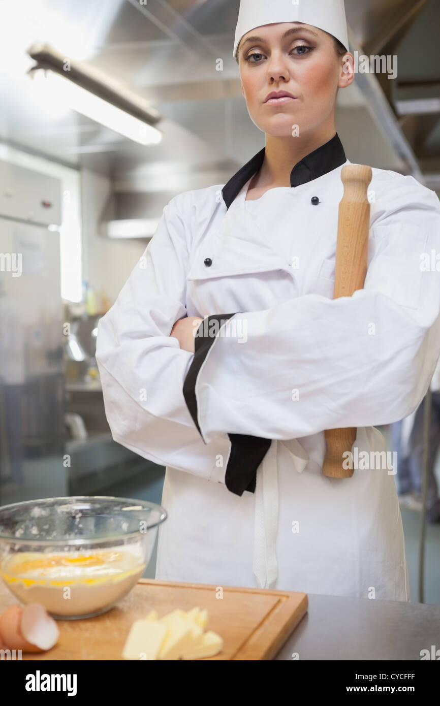Baker holding rolling pin Stock Photo - Alamy