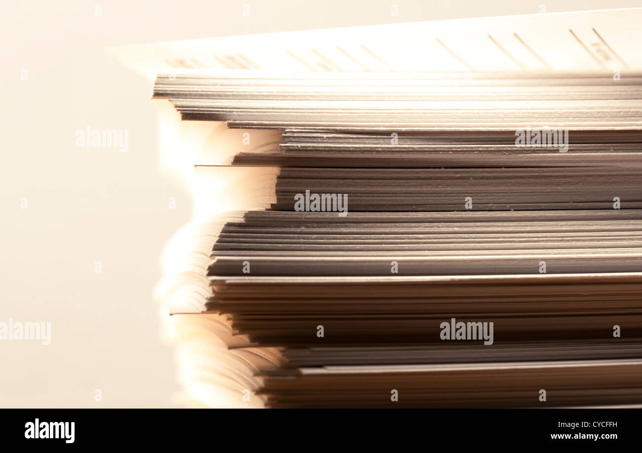 Stack of paper cards in yellow Stock Photo - Alamy