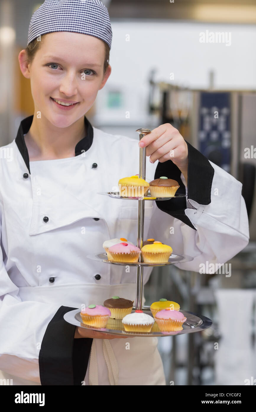 Smiling chef holding tray hi-res stock photography and images - Alamy