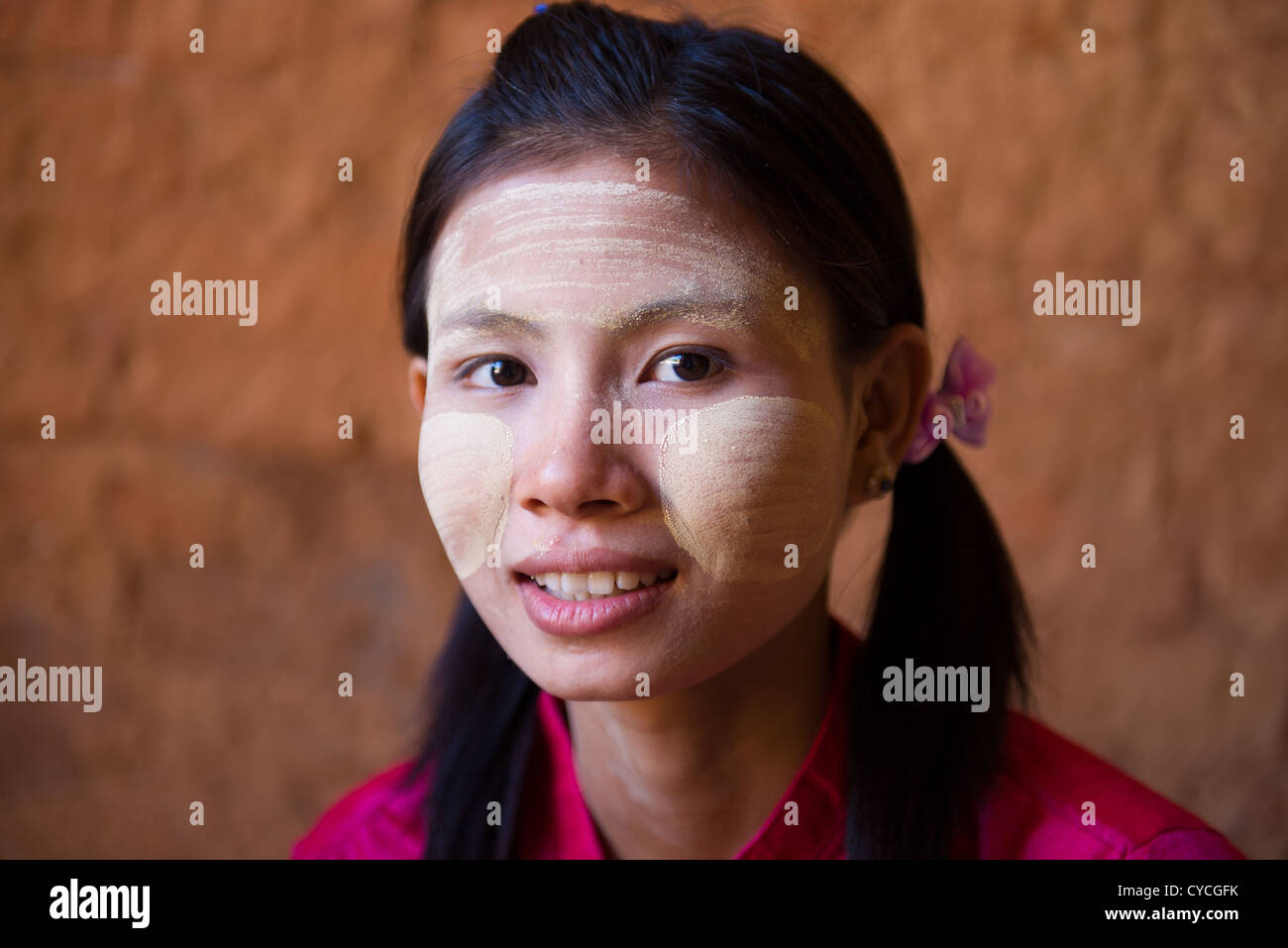 casual myanmar girl on thanaka smiling, close up face Stock Photo - Alamy