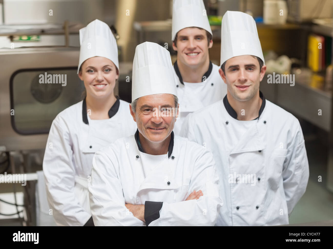 Smiling team of Chef's Stock Photo - Alamy
