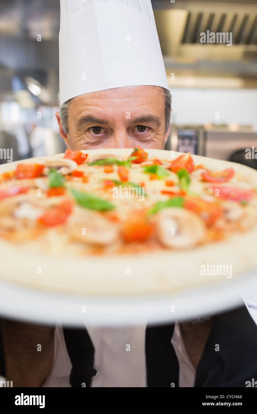 Man holding pizza Stock Photo - Alamy