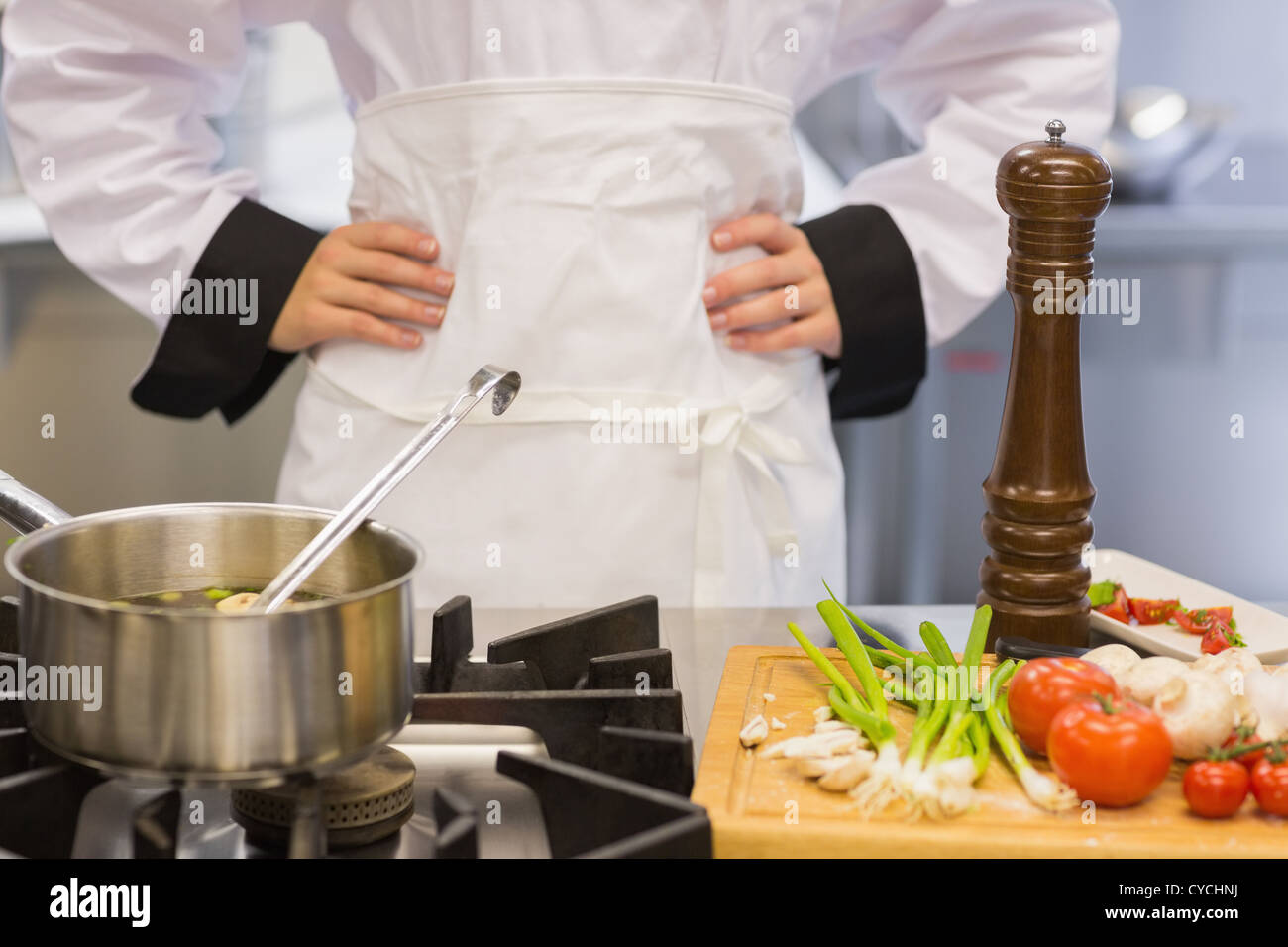 Chef making soup Stock Photo - Alamy